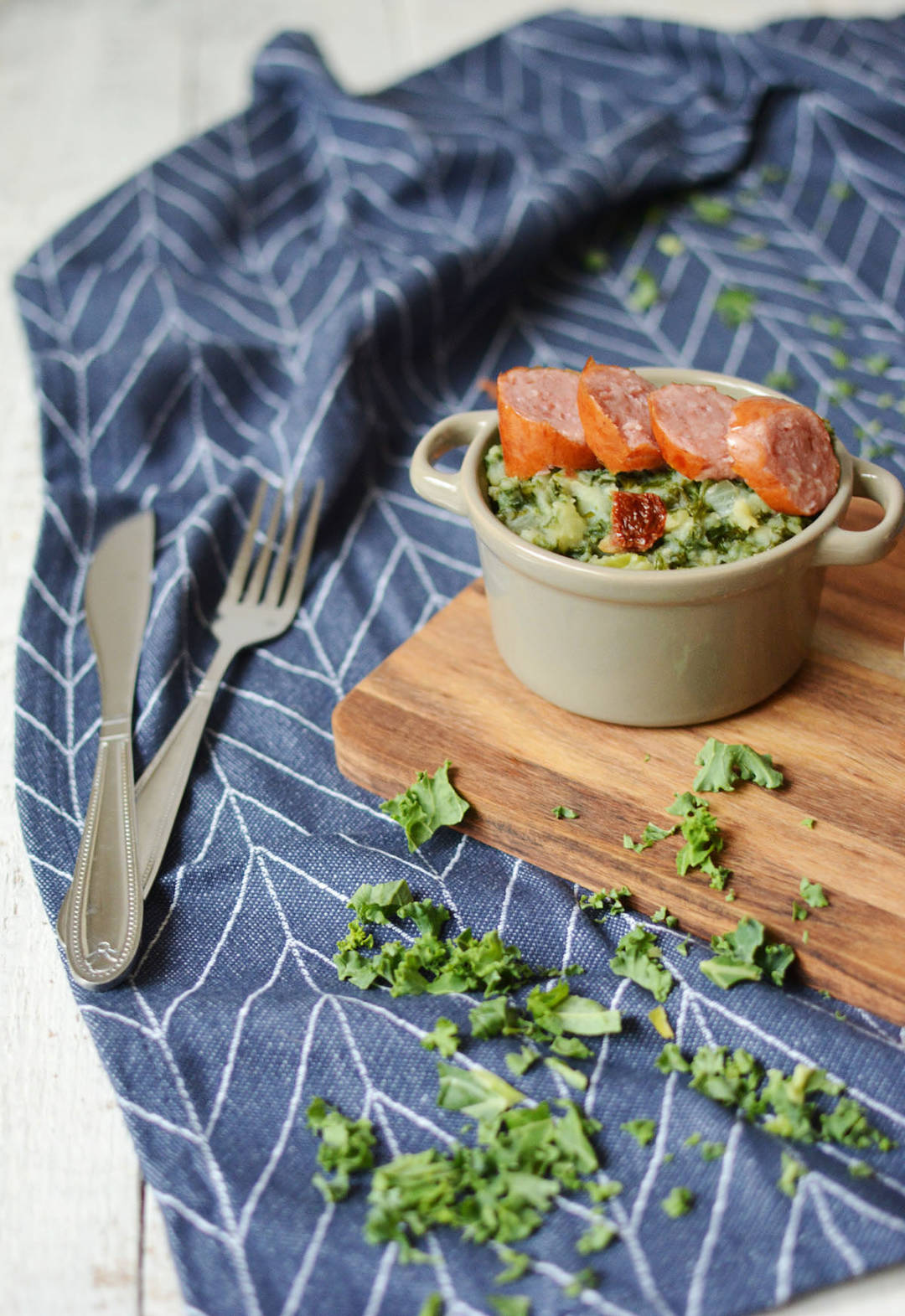 Boerenkoolstamppot met zongedroogde tomaatjes en ui